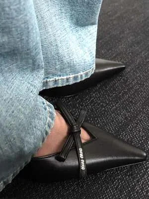 Miu Miu Black Leather Pointed Toe Slingback Pumps With Bow Detail
