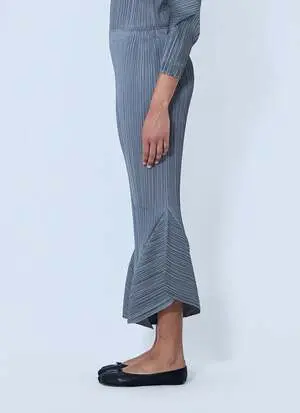 Issey Miyake Mid Rise Flared Pleated Trousers