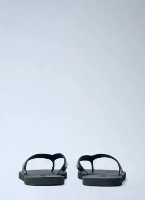 Prada Embossed Logo Leather Flip-flop Sandals
