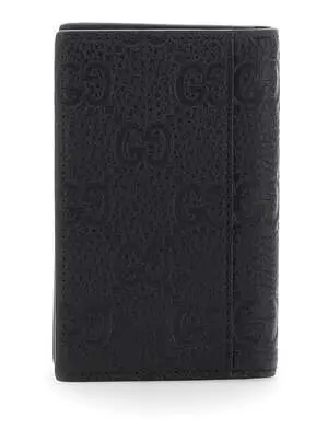 Gucci Black Gg Vertical Bi-fold Wallet In Hammered Leather