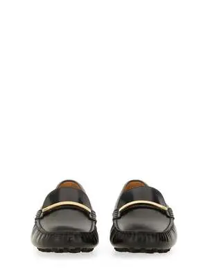 TOD'S Calfskin Moccasins With Gold Tone Bar Detail - Black
