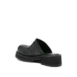 Balenciaga Leather Buckled Clogs