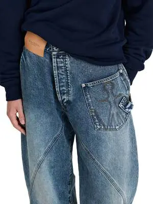 JW Anderson Twisted Denim Jeans With Off-center Closure - Multicolor