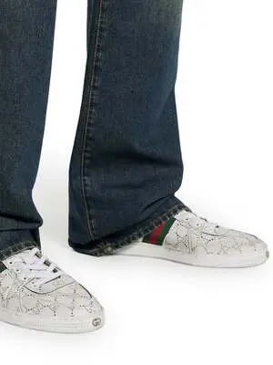 Gucci Low-top Leather Sneakers With Laser-cut Gg Motif