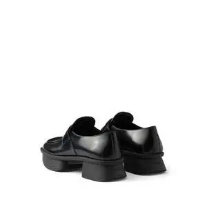Prada Patent Leather Slip-on Loafers With Embossed Logo - Black