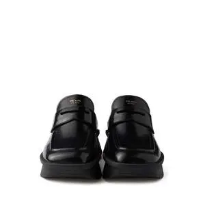 Prada Patent Leather Slip-on Loafers With Embossed Logo - Black