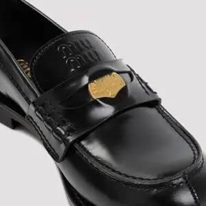 Miu Miu Leather Loafers With Metal Plaque - Black