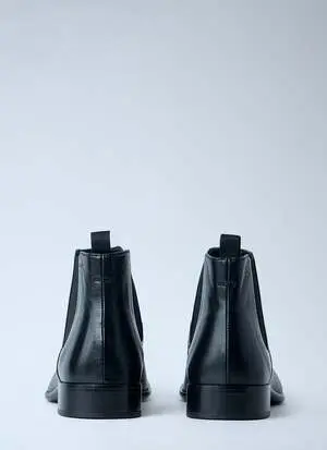 Prada Leather Chelsea Boots With Elastic Side Panels - Black