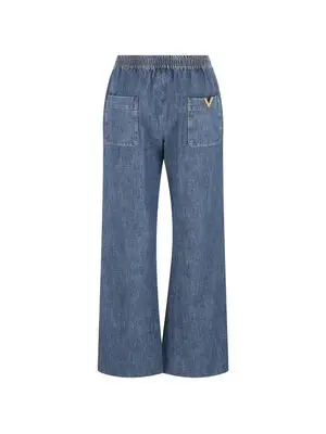 Valentino Garavani Wide-leg Jeans With Tassel Detail - Blue
