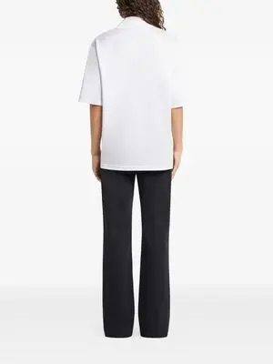 COURREGES Courrèges Oversized V-neck Sports Polo
