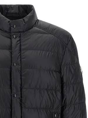 Moncler Quilted Down Jacket With High Neck And Logo Patch - Blue