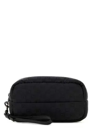 Gucci Monogrammed Canvas Clutch - Black