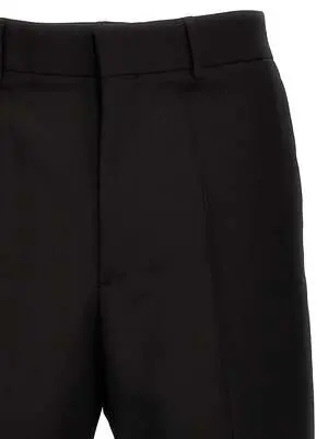 Valentino Garavani Wool Carrot Fit Trousers