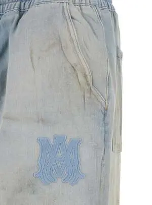 Amiri Light Bliue Pants With Elastic Waist And Logo Patch On The Front In Cotton