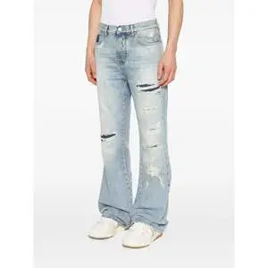 Amiri Distressed Denim Bootcut Jeans