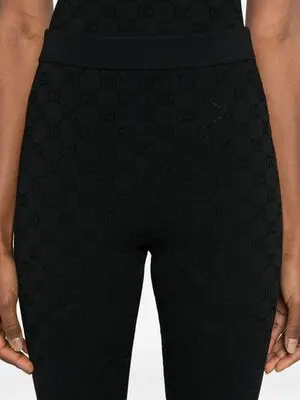 Gucci Skinny Fit Trousers With Allover Logo