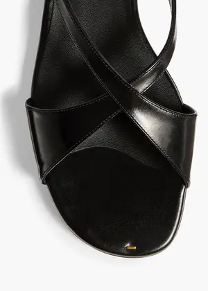 Khaite Liria Glazed Leather Ankle Strap Flat Sandals