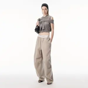 Alexander Wang Mid-rise Pleated Wide-leg Pants With Logo Elastic Waist