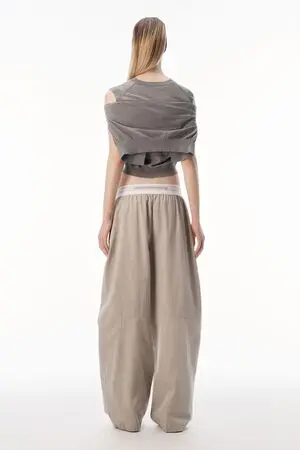 Alexander Wang Mid-rise Pleated Wide-leg Pants With Logo Elastic Waist - Stone