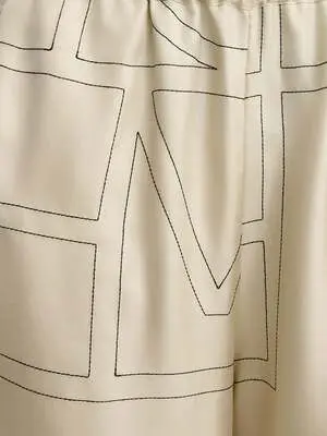TOTEME Organic Silk Bermuda Shorts With Monogram Embroidery - Cream