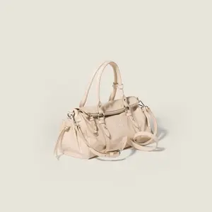 Miu Miu Shiny Leather Handbag With Drawstring Pockets - Traverite