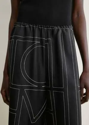 TOTEME Monogram Embroidered Relaxed Shorts - Black