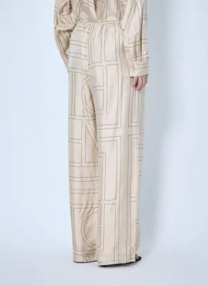 TOTEME Monogram-print Silk Wide-leg Trousers - Ivory