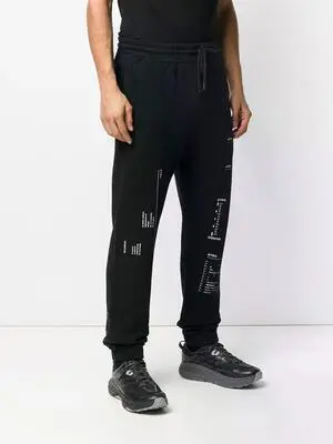 COUNTY OF MILAN Printed Track Pants