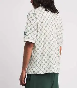MANORS Piqué Monogram Goat Polo Shirt