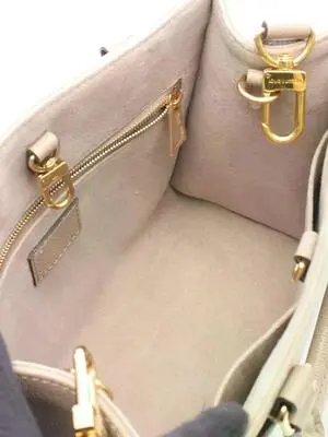 LOUIS VUITTON Monogram Empreinte Giant Onthego Pm Satchel - Brown