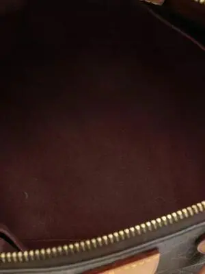 LOUIS VUITTON Monogram Rivoli Pm Satchel
