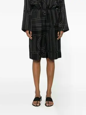 TOTEME Monogram Print Shorts