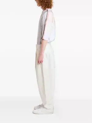 HOUSE OF THE VERY ISLANDS Jonas Pleated Cotton Trousers - Neutrals