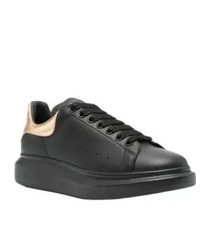 Alexander McQueen Oversized Leather Sneakers With Metallic Heel Detail - Black