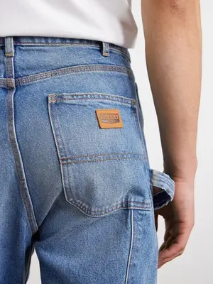 CHERRY LOS ANGELES Paint-splattered Distressed Carpenter Jeans