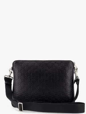 Gucci Leather Gg Emblem Crossbody Bag With Embossed Gg Motif - Black