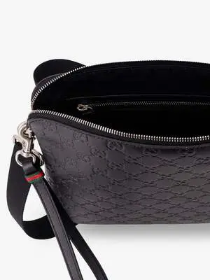 Gucci Leather Gg Emblem Crossbody Bag With Embossed Gg Motif - Black