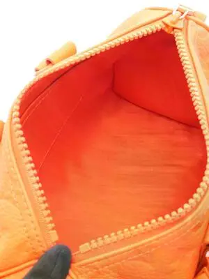 LOUIS VUITTON Monogram Empreinte Keepall Bandouliere 25 Boston Bag - Orange