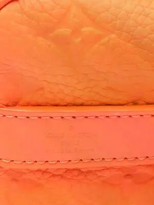 LOUIS VUITTON Monogram Empreinte Keepall Bandouliere 25 Boston Bag - Orange