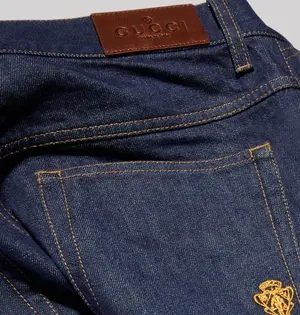 Gucci Logo Patch Jeans