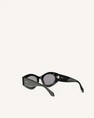 Alaïa Oval Sunglasses - Black