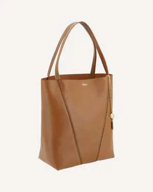 Chloé Grained Leather Spin Shoulder Bag With Monogram Detail