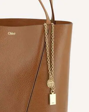 Chloé Grained Leather Spin Shoulder Bag With Monogram Detail - Brown