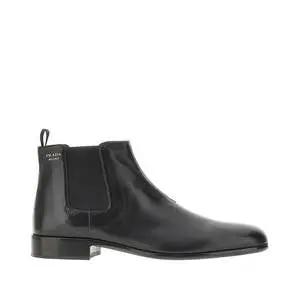 Prada Leather Chelsea Boots With Gold Tone Logo Print