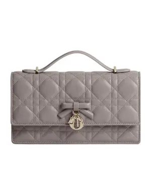 Dior Quilted Flap Crossbody Bag With Bow Detail