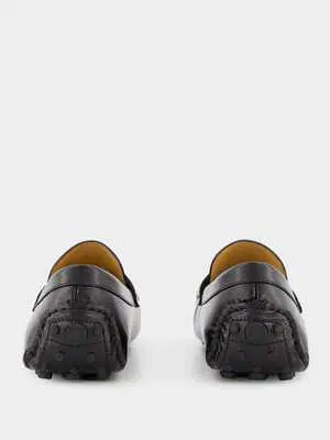 FERRAGAMO Gancini Ornament Driver Loafers In Hammered Calfskin - Black
