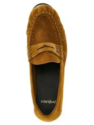 Saint Laurent Le Loafer In Matte Leather With Antiqued Cassandre Logo