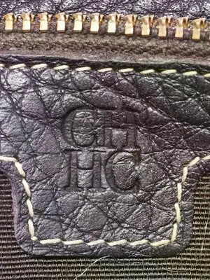 Carolina Herrera Monogram-embossed Wallet