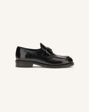 Prada Leather Loafers With Metal Triangle Logo
