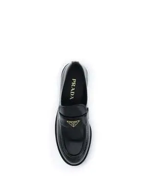 Prada Leather Loafers With Metal Triangle Logo
